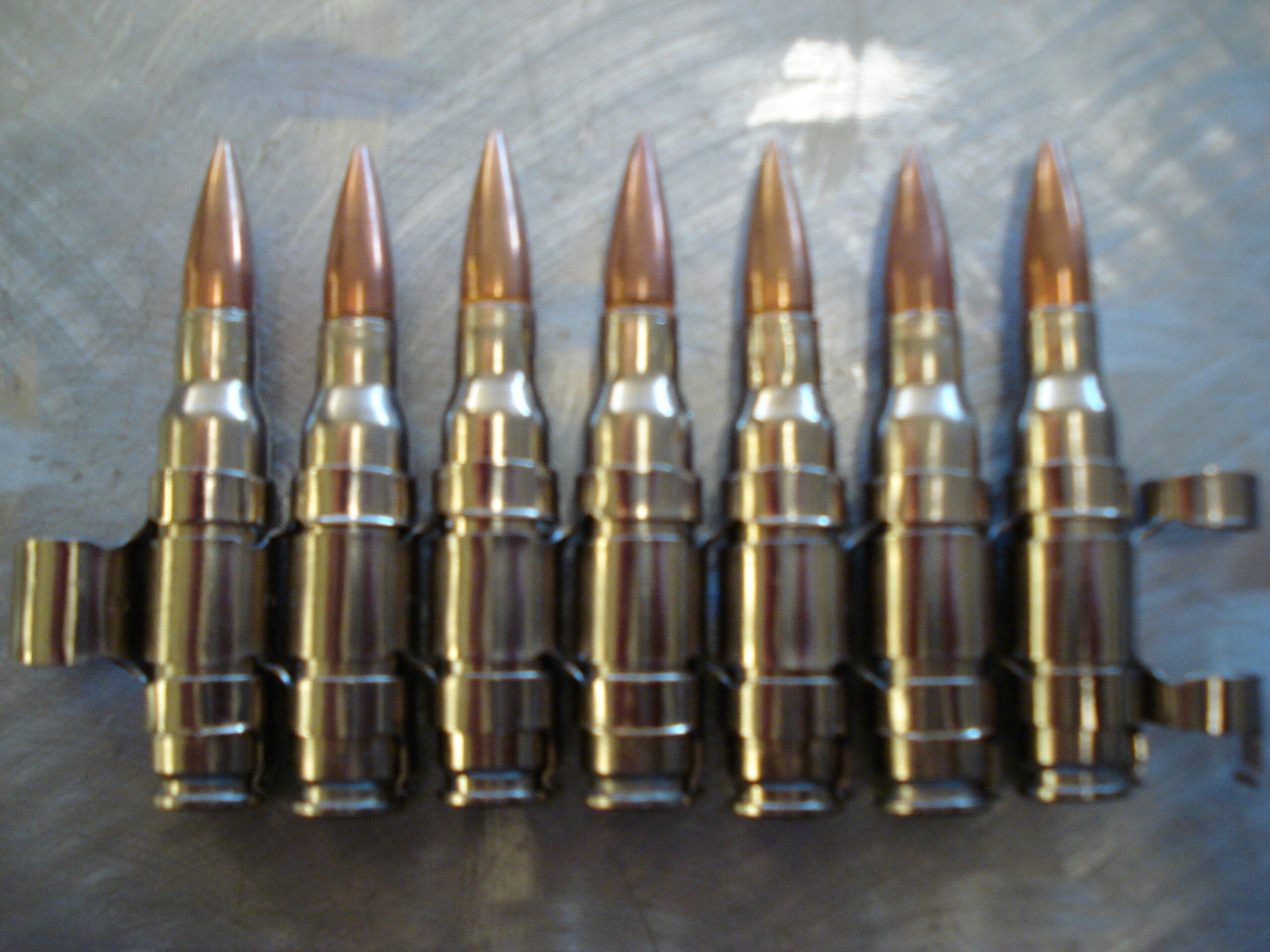 M60 Bullet Strip of 7- Copper Tip Nickle Link (HEAVY METAL)